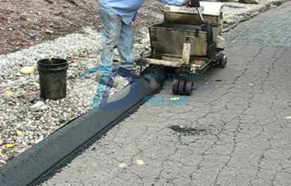 Asphalt curb Extruder - THU DUC MECHANICAL AND TRADING COMPANY LIMITED